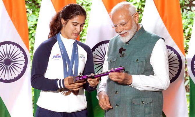 Manu Bhaker meets, 'coaches' PM Modi on pistol